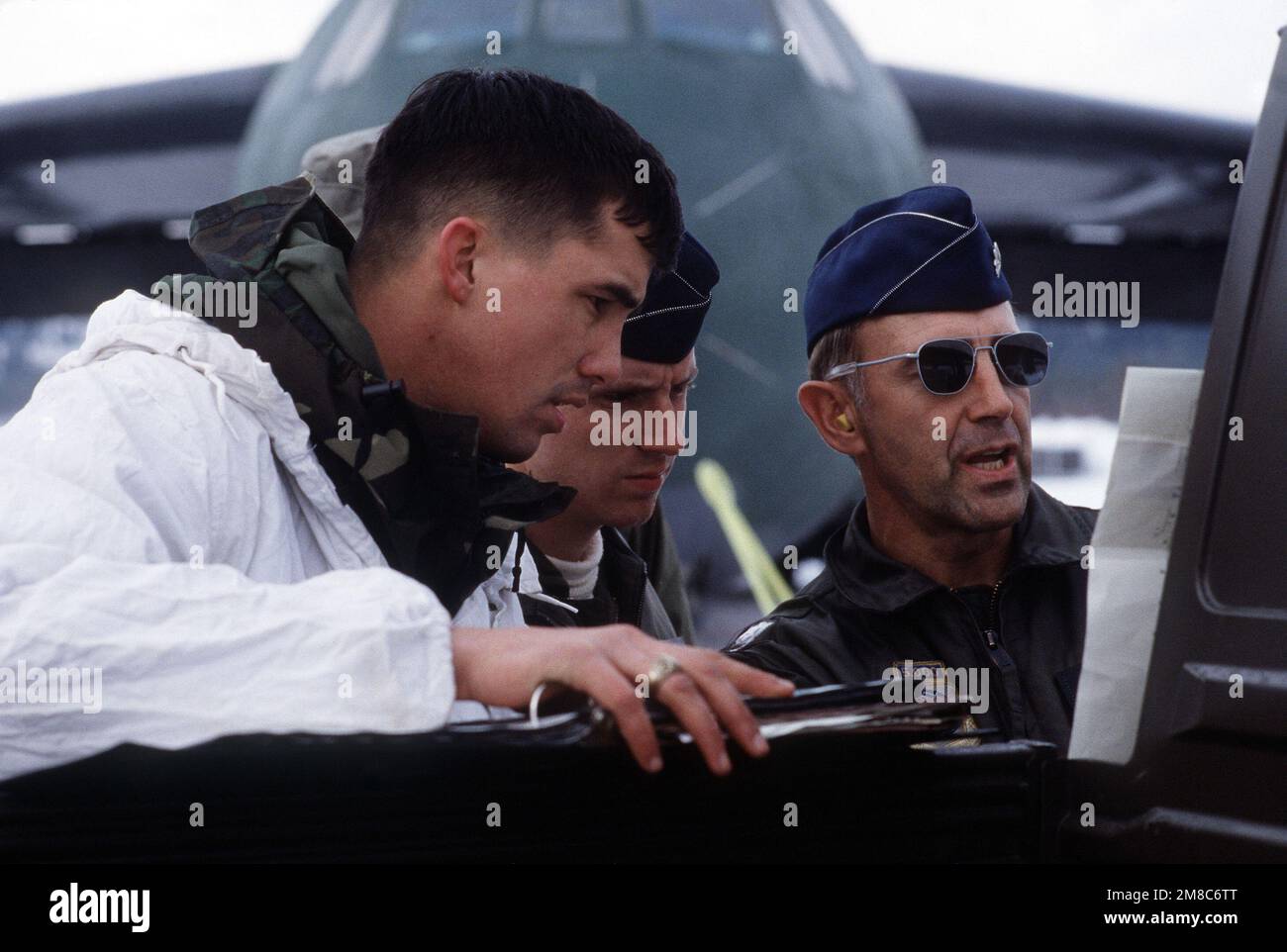 LTC Anthony J. Lolas, 17th Military Airlift Squadron briefs Marines of ...