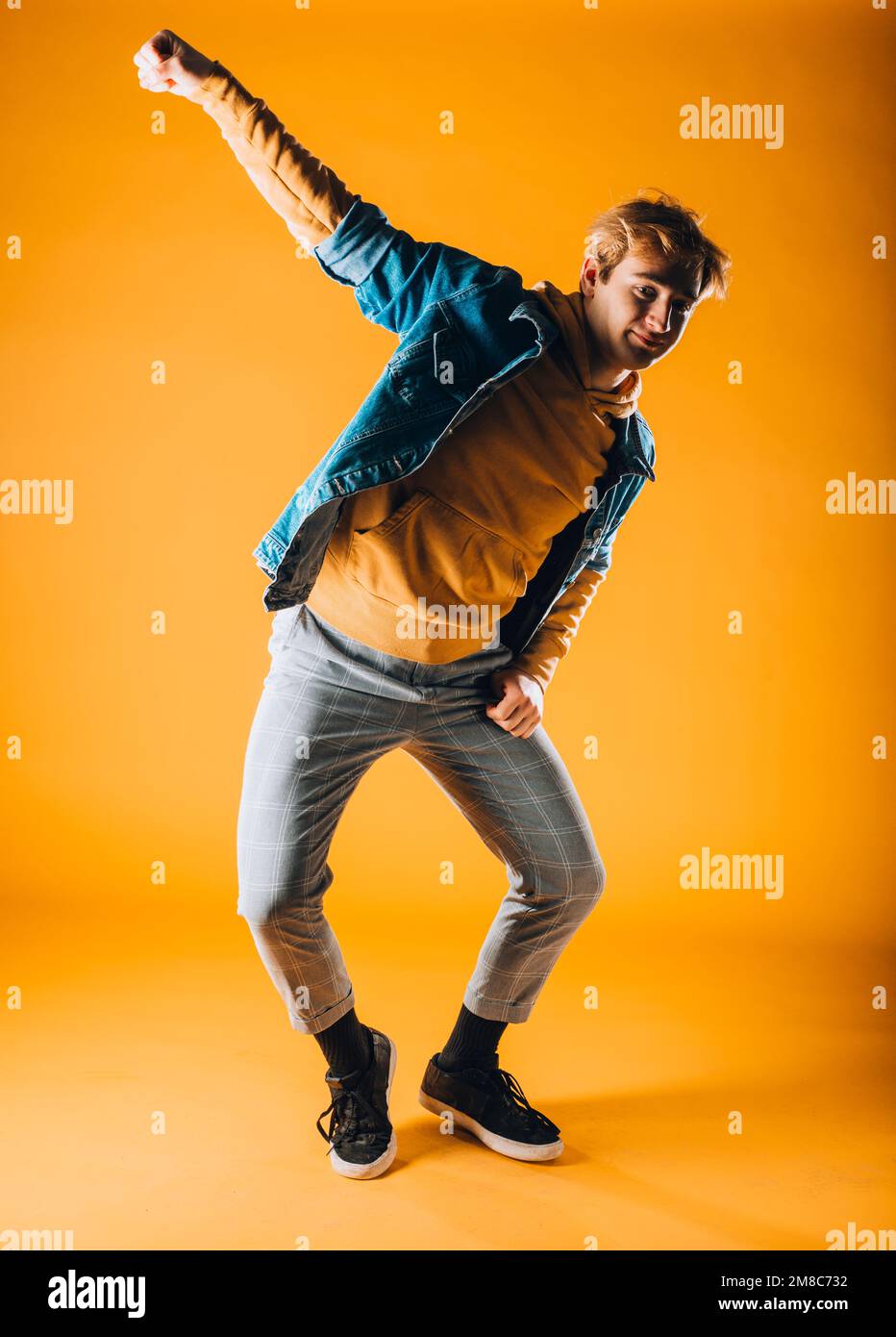 Young athletic man performing contemporary dance moves Stock Photo - Alamy