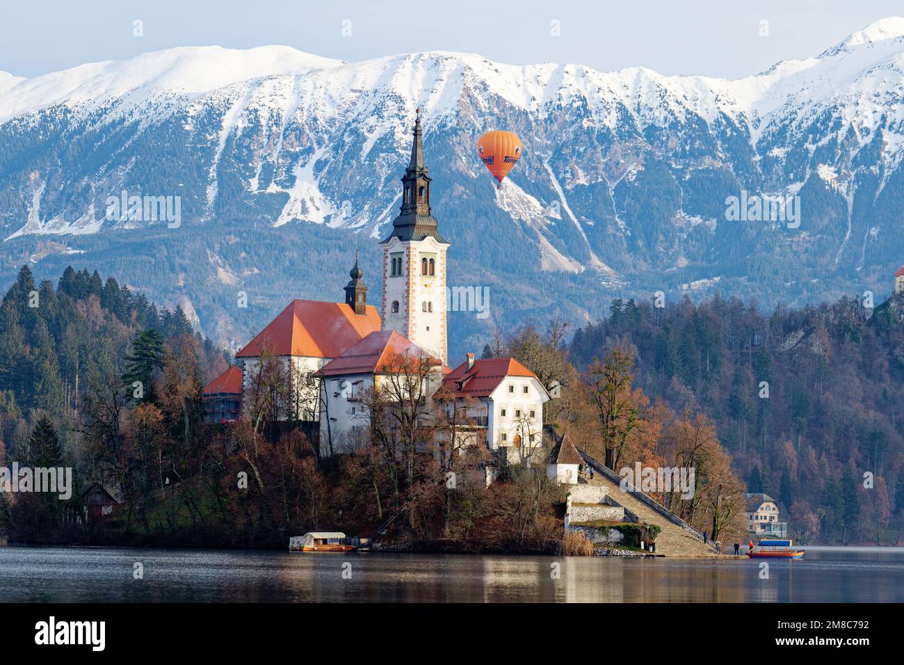 Sunrise winter scenery of magical Lake Bled. A winter tale for romantic ...