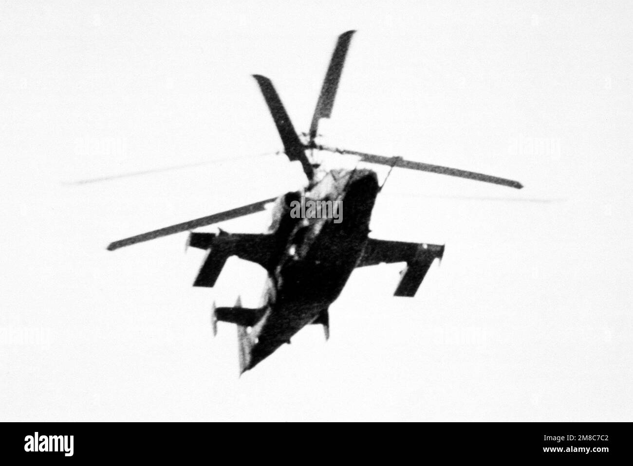 A front right underside view of a Hokum helicopter on a test flight ...