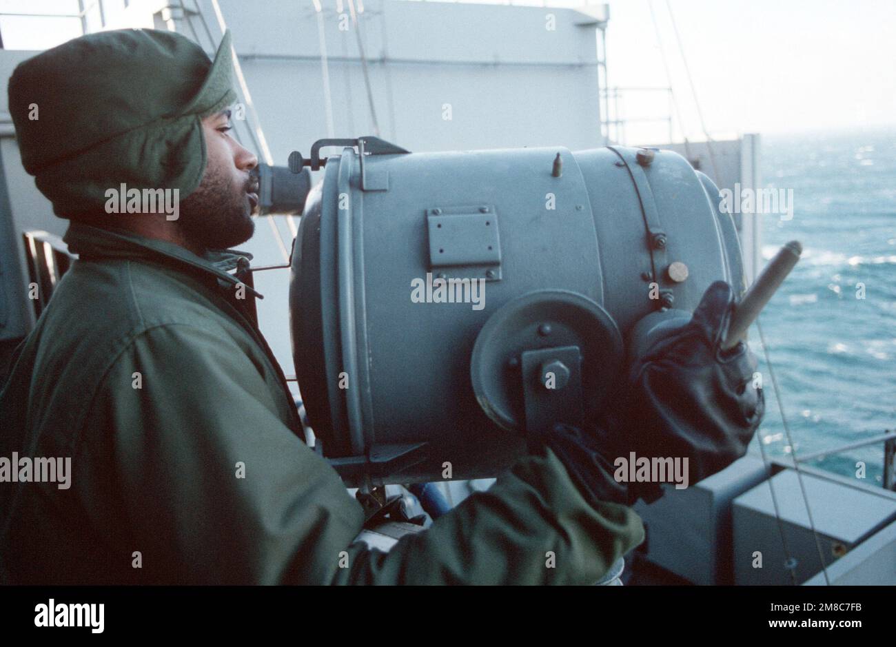 A sailor aboard the aircraft carrier USS CONSTELLATION (CV 64) operates ...
