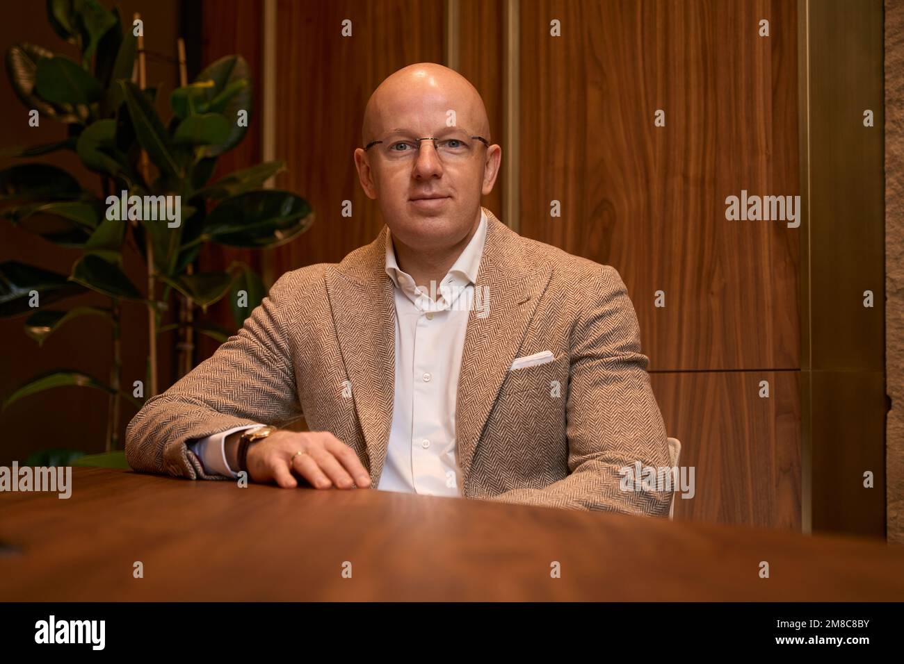 Handsome stylish bald manager hi-res stock photography and images - Alamy