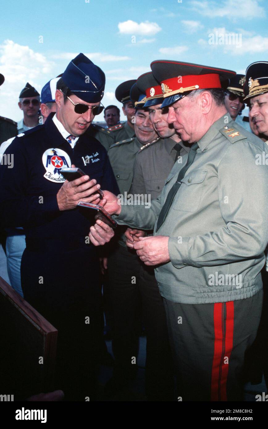 Soviet Defense Minister General Dmitriy T. Yazov, right, accepts a gift ...
