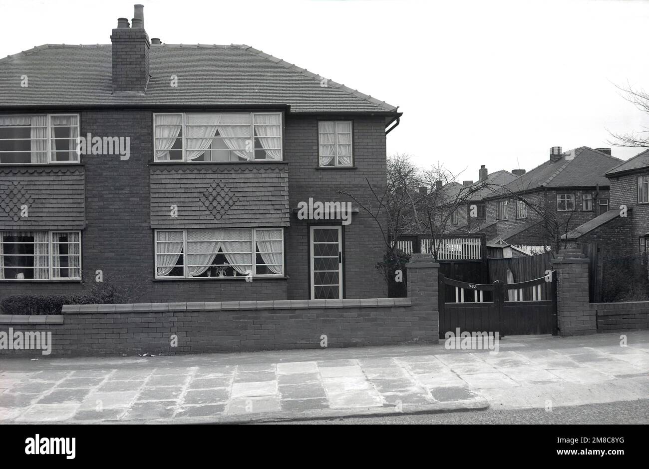 1950s, historical, exterior view of a semi-datched, two-storey suburban ...