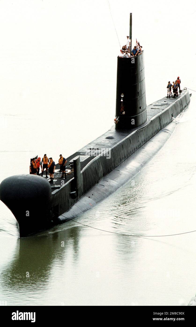 Crewmen stand on the deck of the British patrol submarine HMS OCELOT (S ...