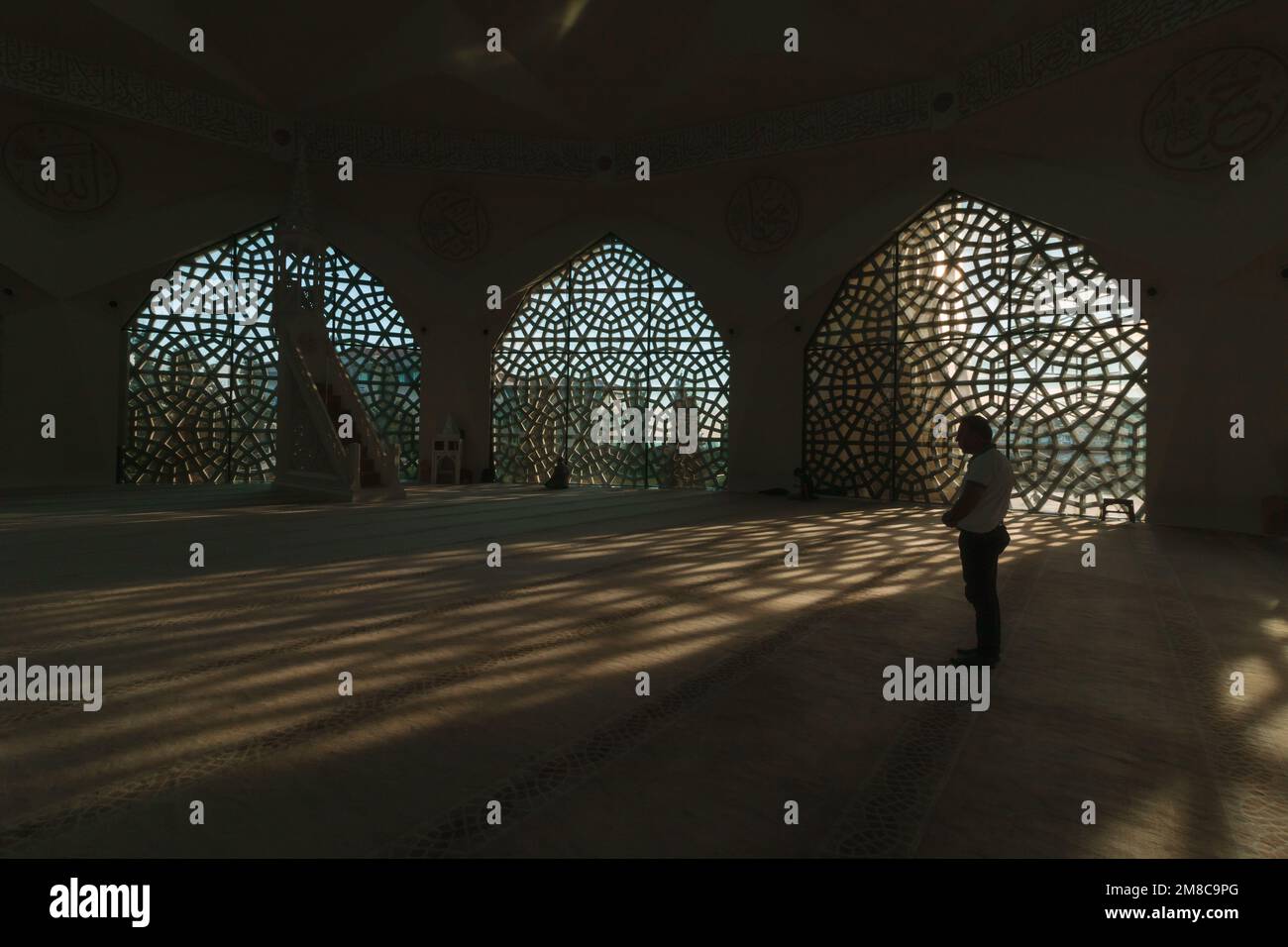 Muslim man praying or salah in a mosque. Islamic background photo ...
