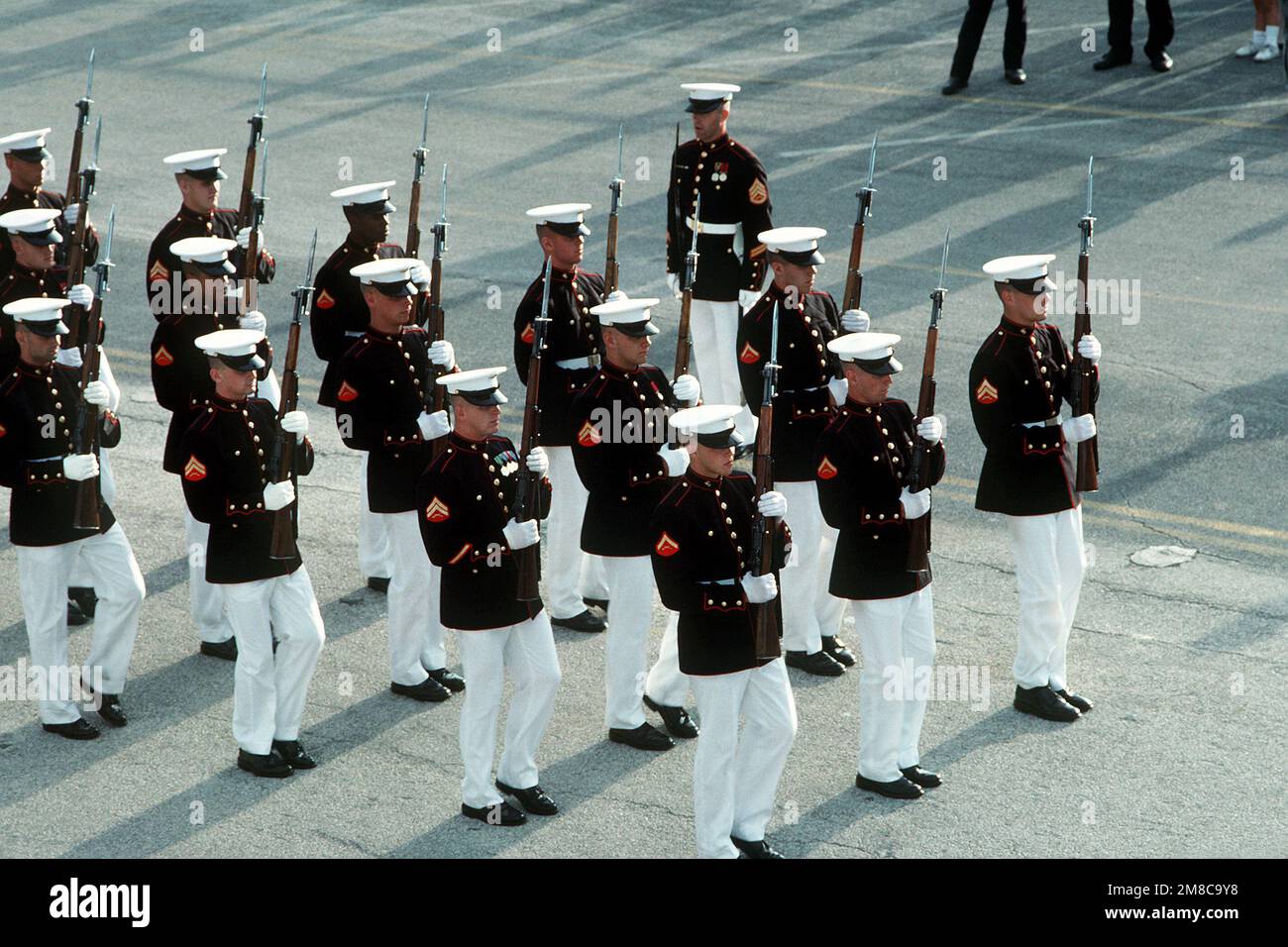 Members of the U.S. Marine Corps Silent Drill Team perform along the ...