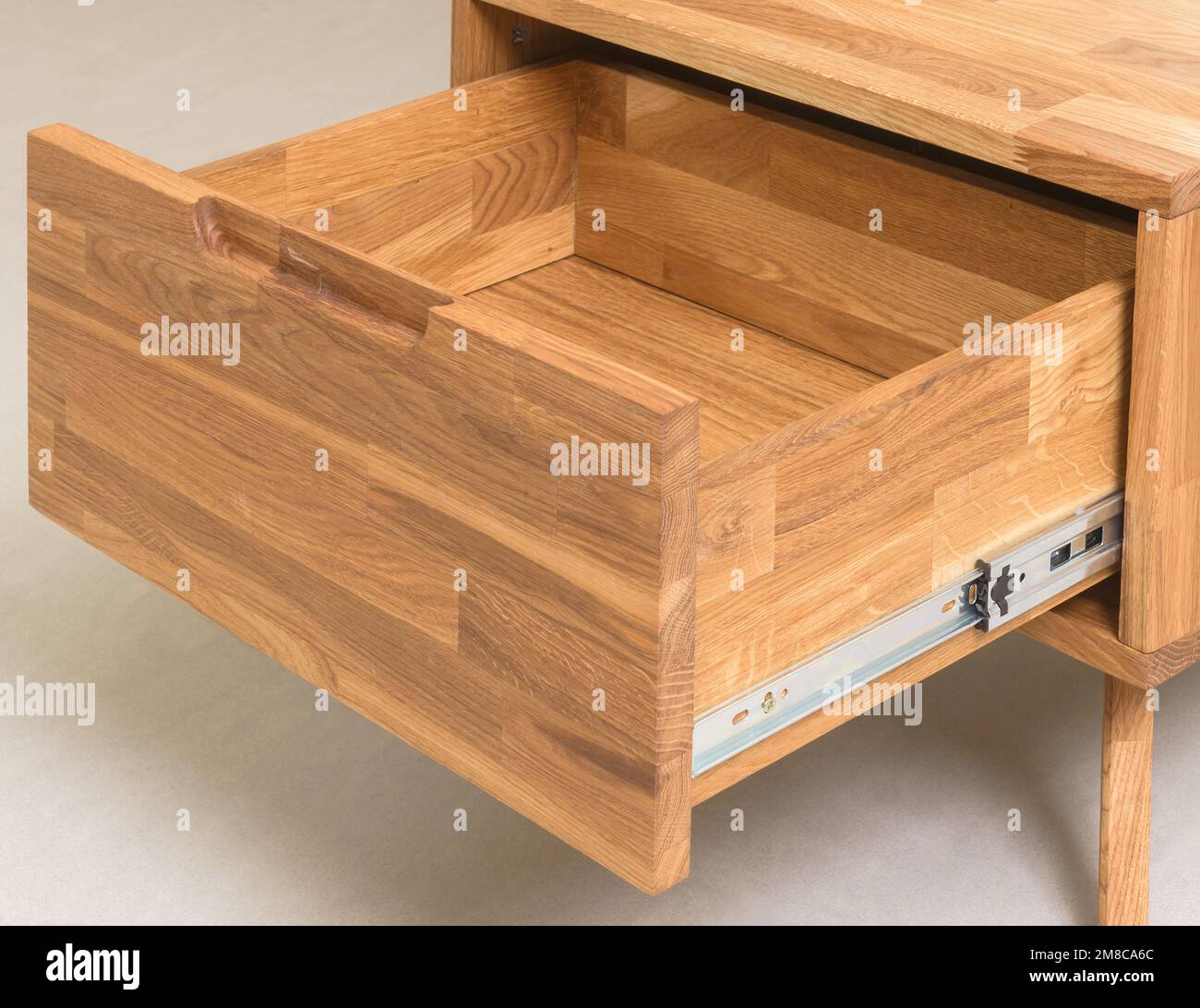 Opened drawer close view photo, wooden furniture elements background ...