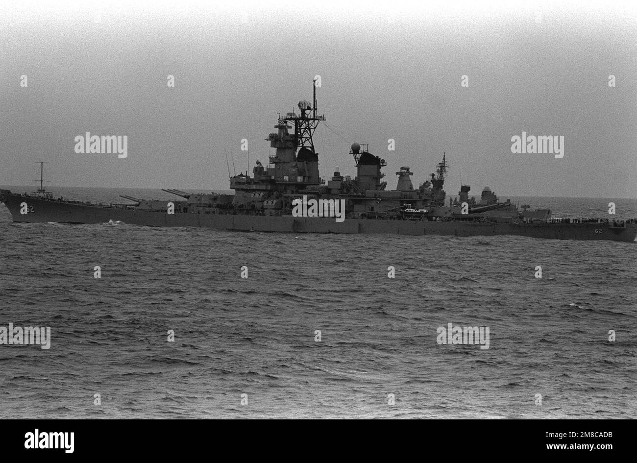 The battleship USS NEW JERSEY (BB-62) steams alongside a Japanese ...