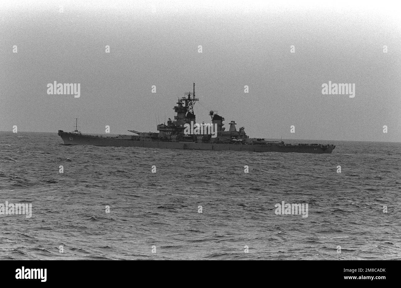 A port beam view of the battleship USS NEW JERSEY (BB-62) underway ...