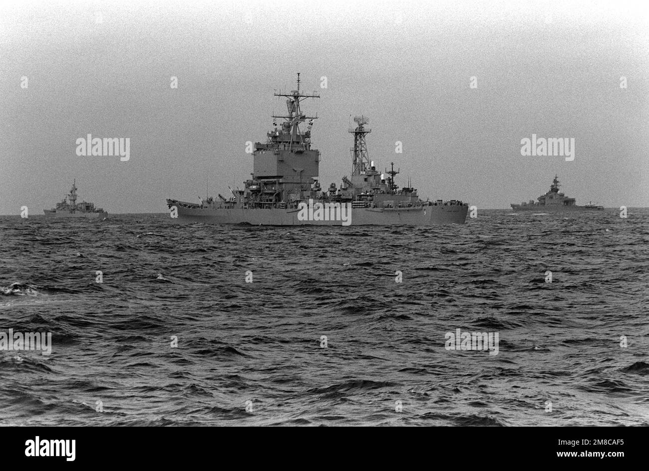 A port quarter view of the nuclear-powered guided missile cruiser USS ...