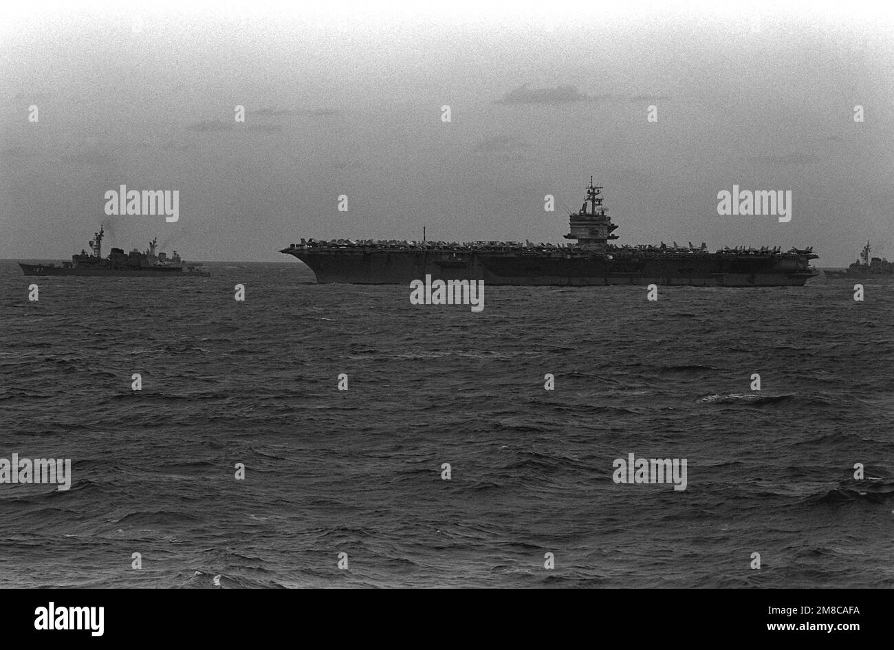 Three Japanese Maritime Self Defense Force destroyers escort the ...