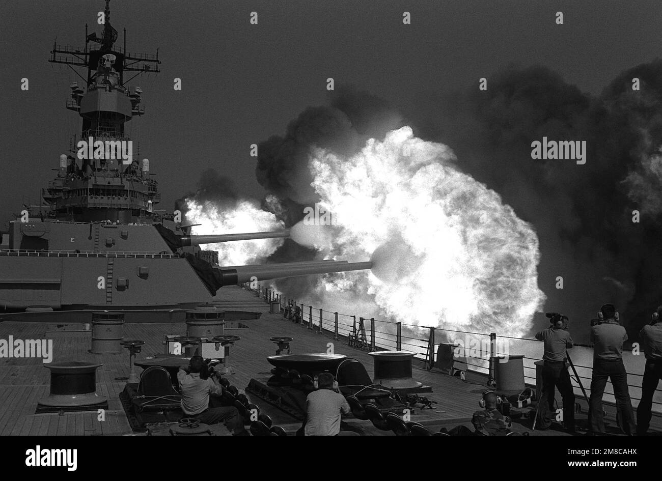 The battleship USS MISSOURI (BB-63) fires a Mark 7 16-inch/50-caliber ...