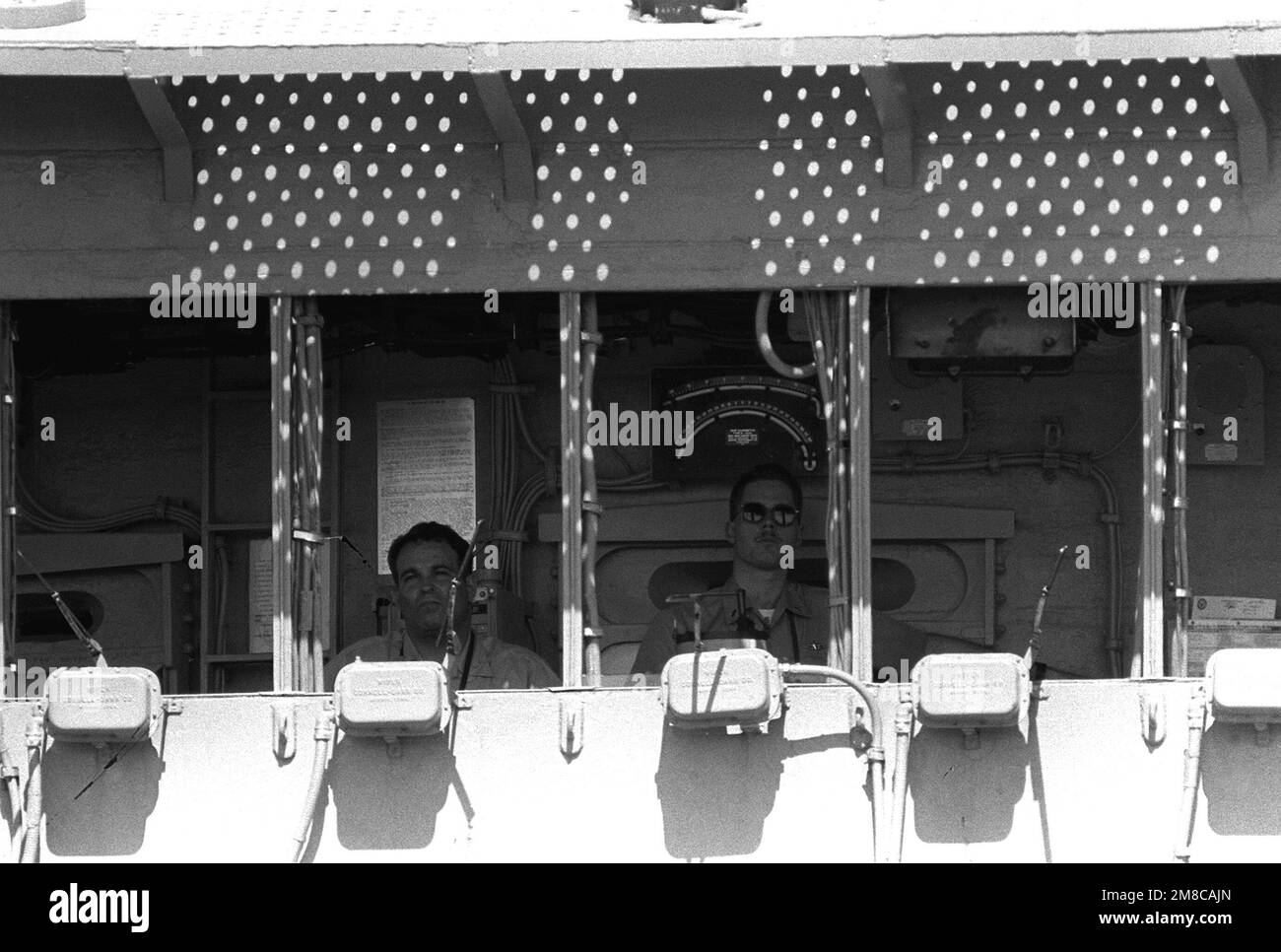 Members of the bridge watch man their stations on the battleship USS ...