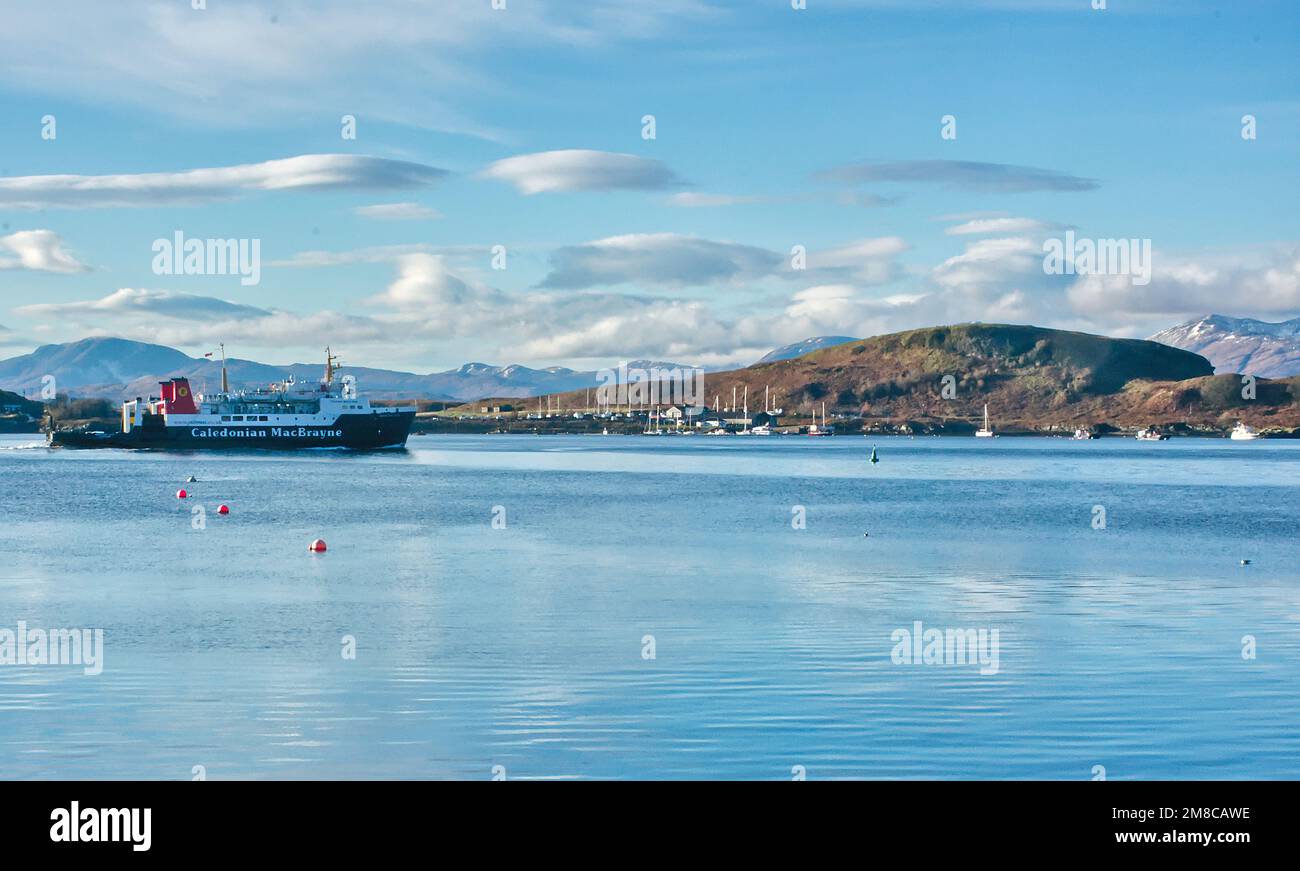 A ferry sails on calm seas at Oban Bay, Oban, Argyll, Scotland Stock ...