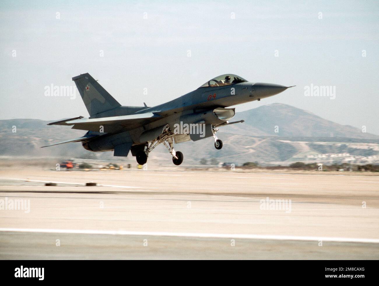 An F-16N Fighting Falcon aircraft of Fighter Squadron 126 (VF-126 ...