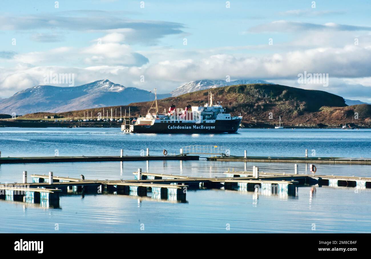 A ferry sails on calm seas at Oban Bay, Oban, Argyll, Scotland Stock ...