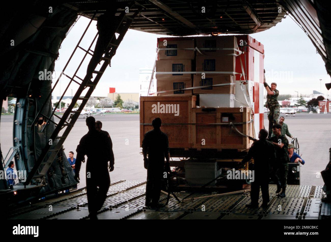 Members of Detachment 2, 619th Military Airlift Support Squadron, and ...