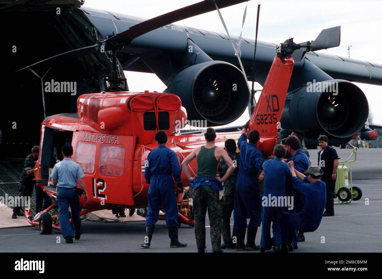 Members of Detachment 2, 619th Military Airlift Support Squadron, and ...