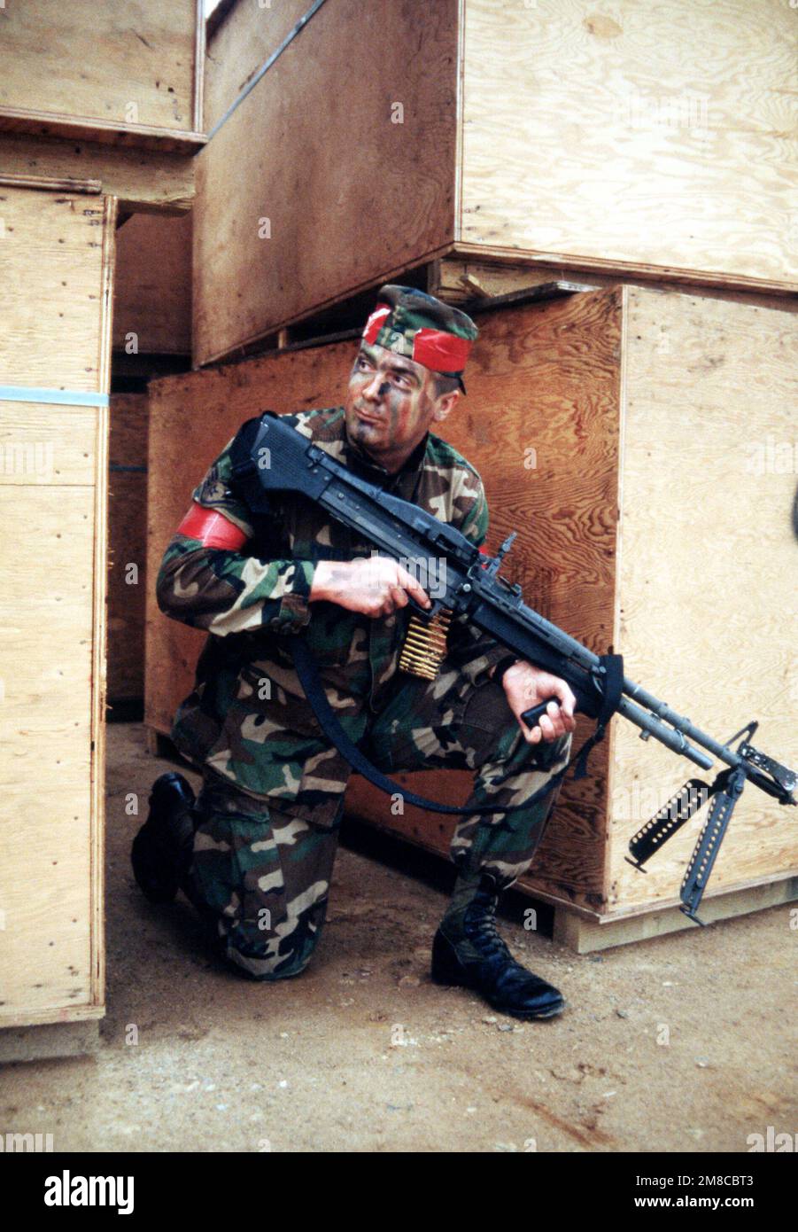 Armed with an M60E3 machine gun, STAFF Sergeant Neil Porter of the 51st ...