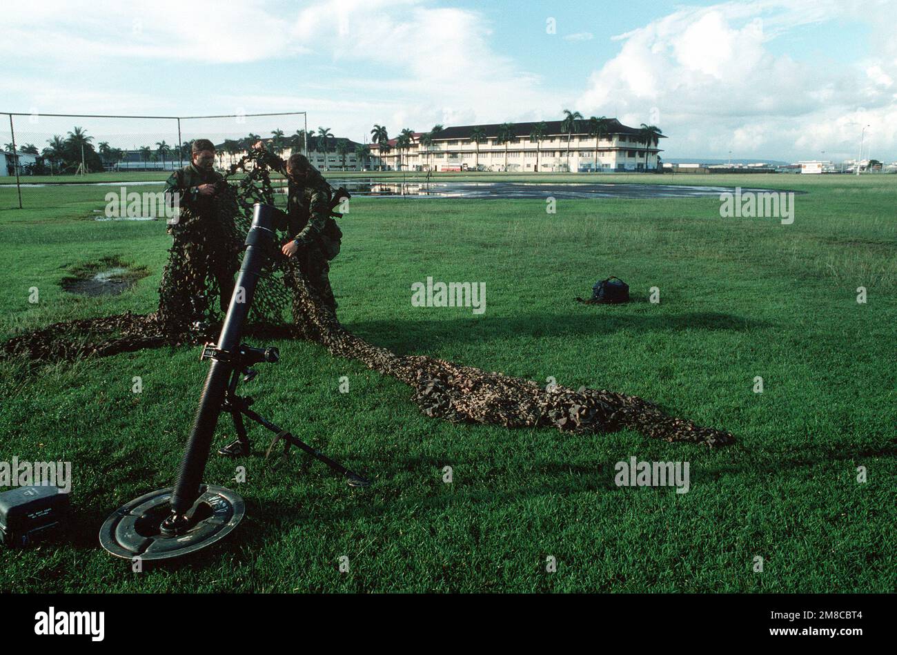 Soldiers from Headquarters Company, Task Force 2-27, set up an M29 81 ...