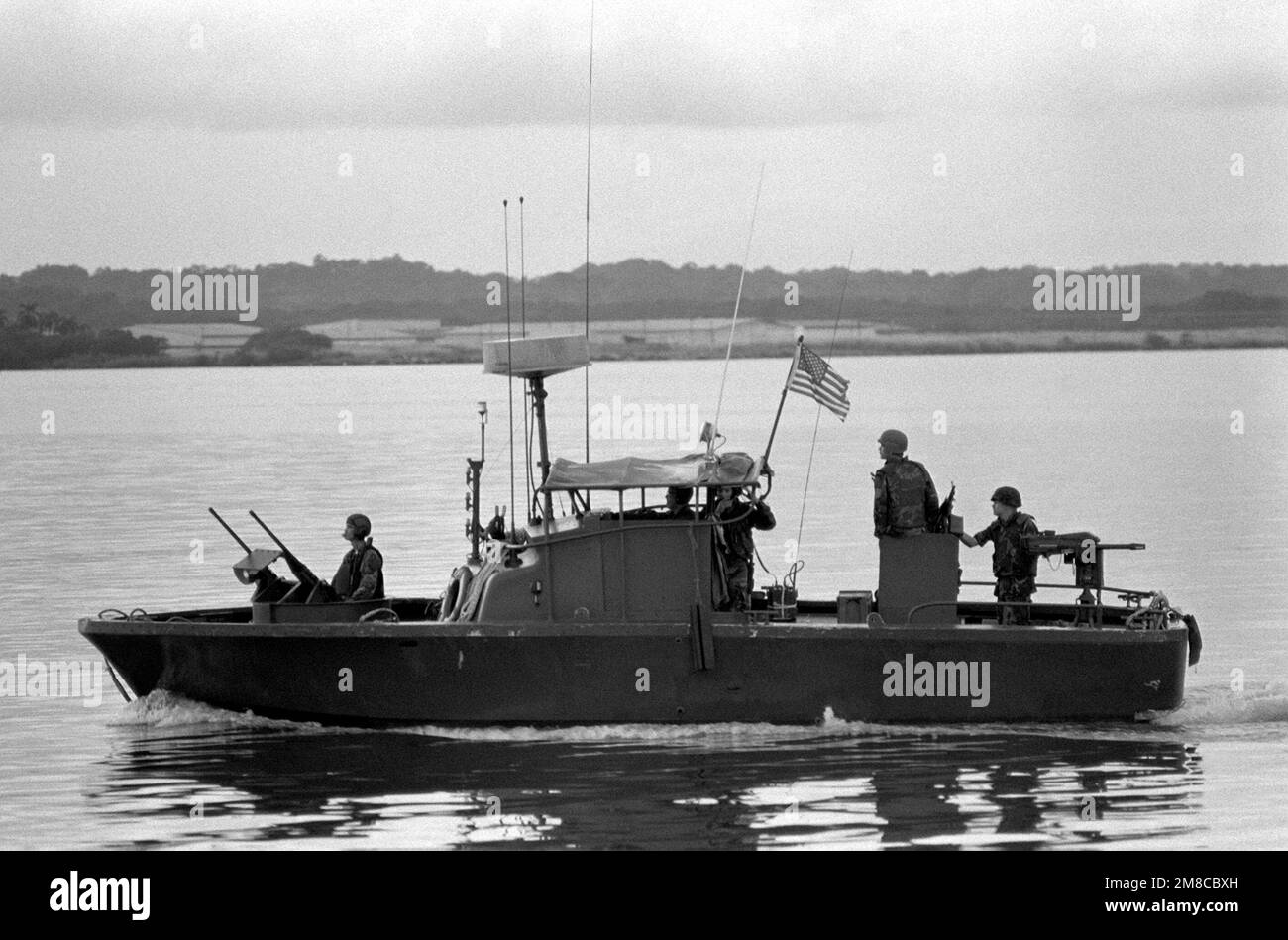 Sailors aboard a Special Boat Unit 26 (SBU 26) PBR Mark 2 riverine ...