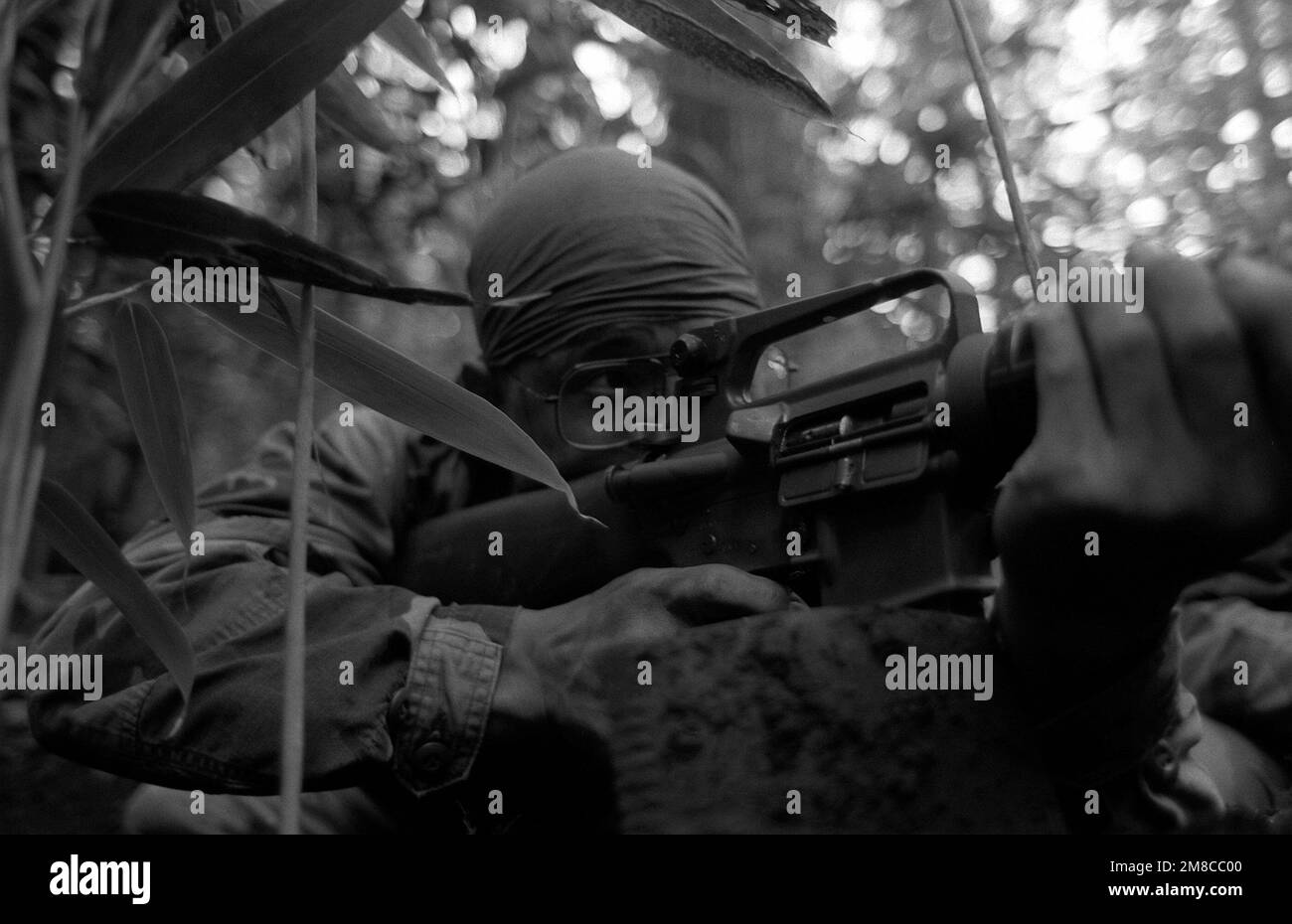 SGT R. Hamilton, Marine Wing Support Squadron 171 (MWSS-171), sights in ...