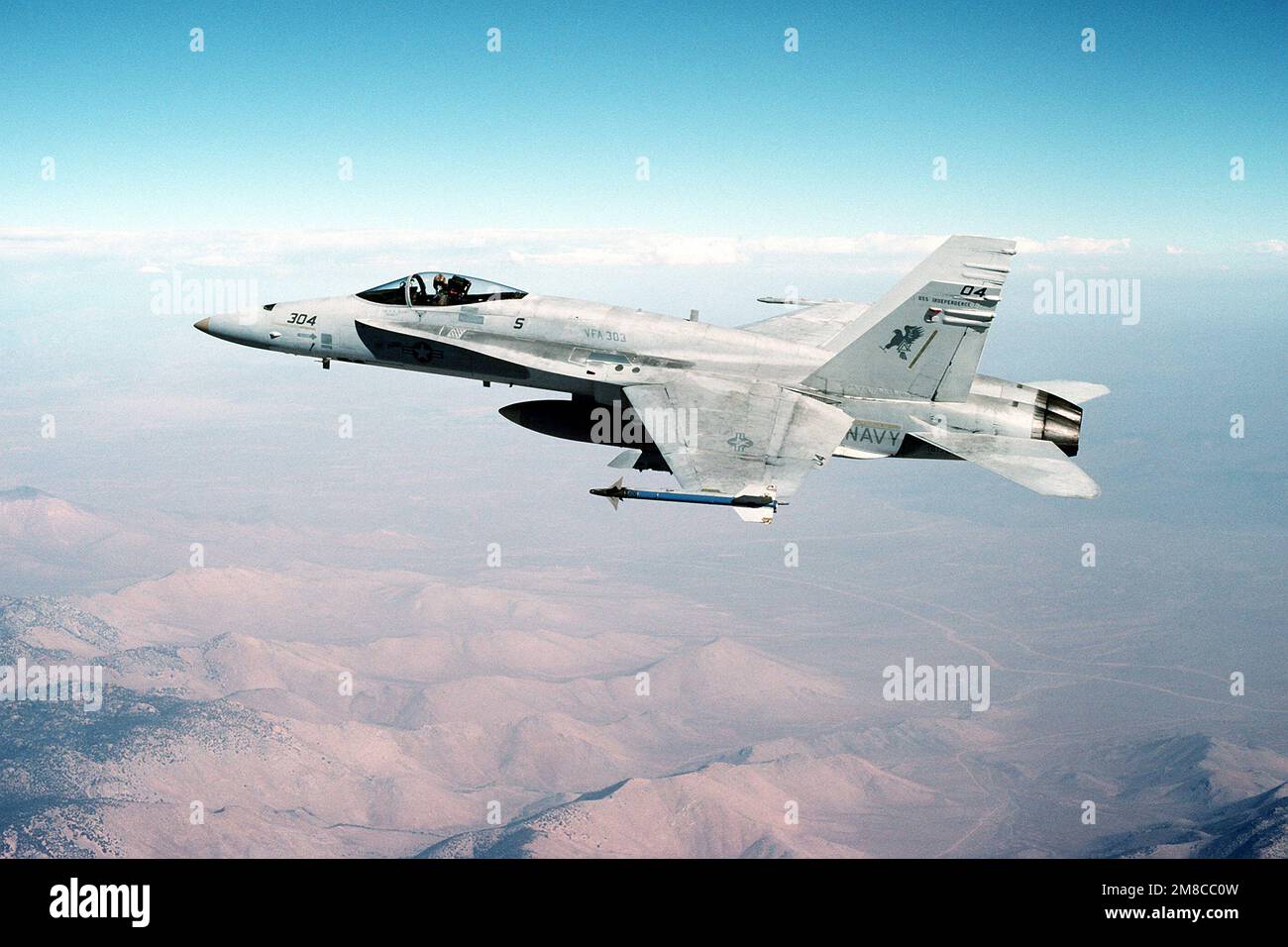 An air-to-air left side view of an F/A-18A Hornet aircraft of Strike ...