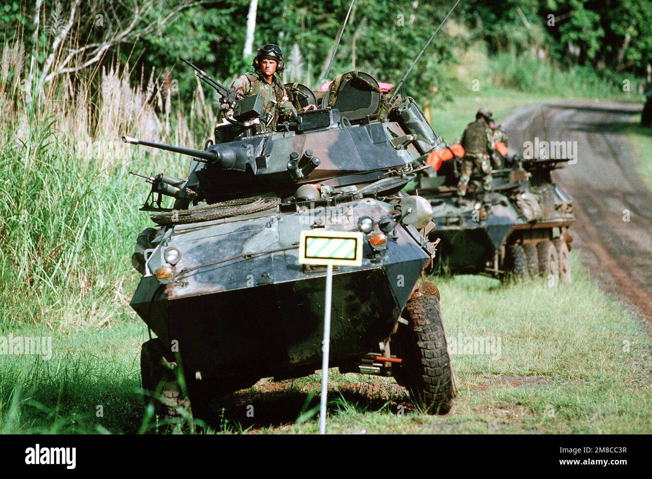 Marines on a 2nd Light Armored Infantry Battalion route reconnaissance pull their LAV25 light ...