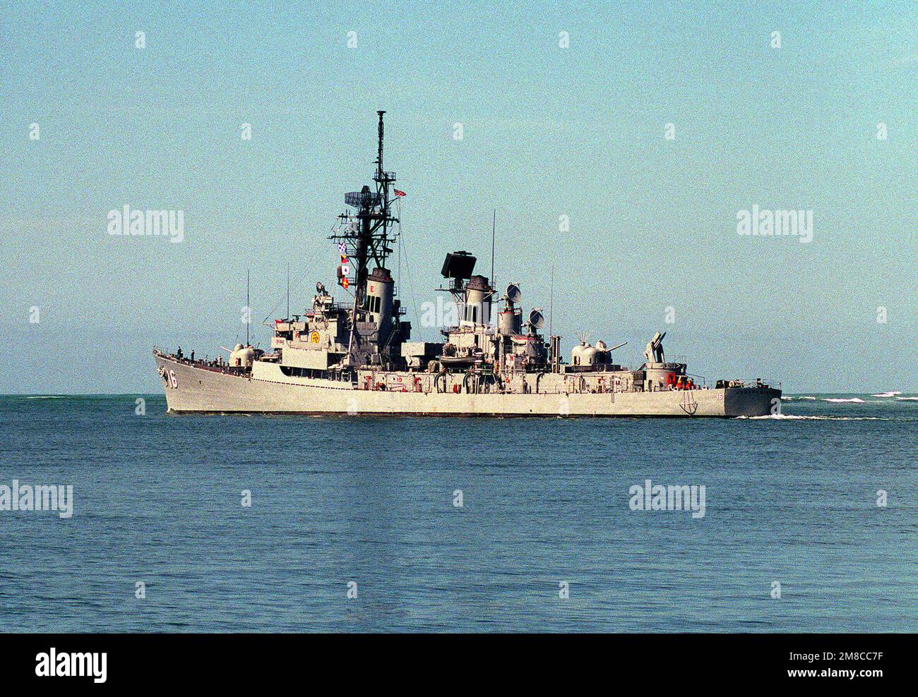 The guided missile destroyer USS JOSEPH STRAUSS (DDG-16) heads out to ...