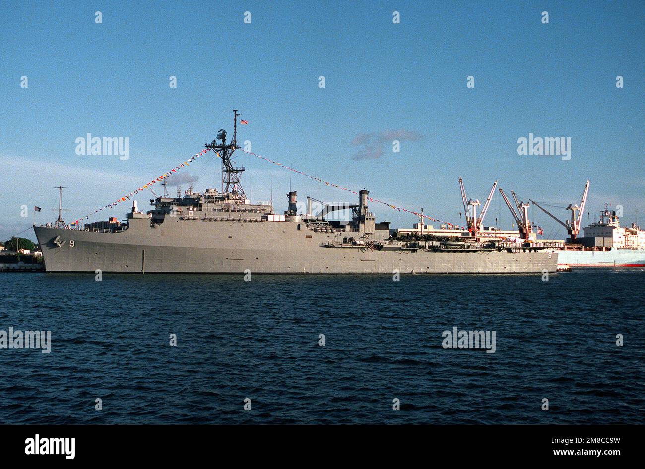 The amphibious transport dock USS DENVER (LPD-9) lies tied up during a ...