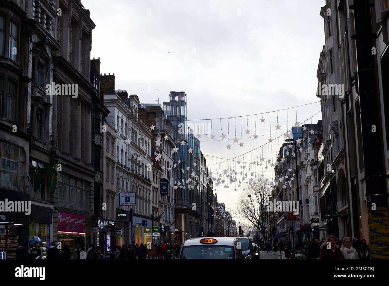 Looking down onto Oxford Street in the city centre of London with shops ...