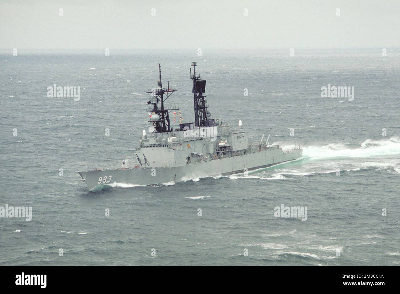 A port bow view of the guided missile destroyer USS KIDD (DDG-993 ...