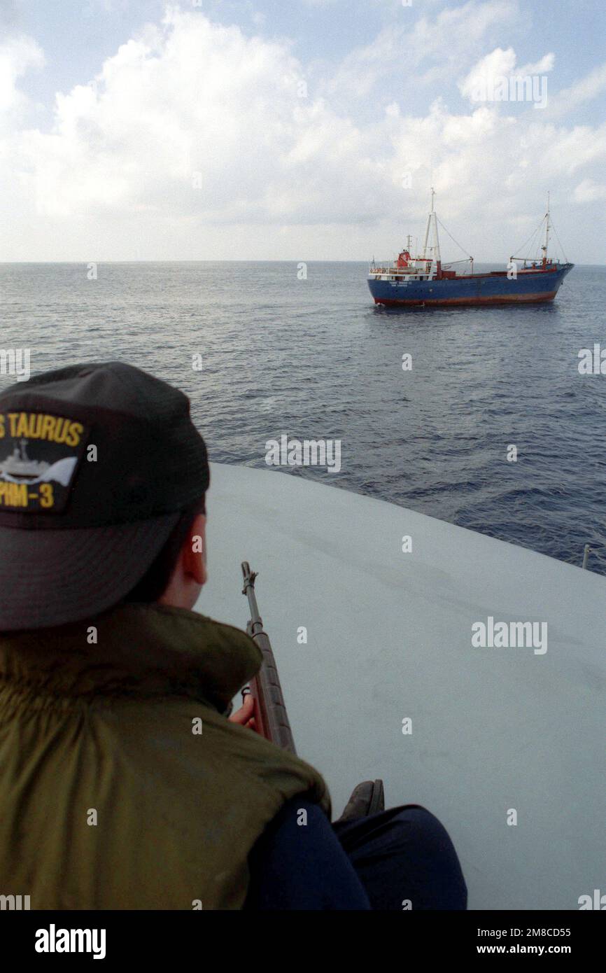 Armed with an M14 rifle, a sailor aboard the patrol combatant missile ...
