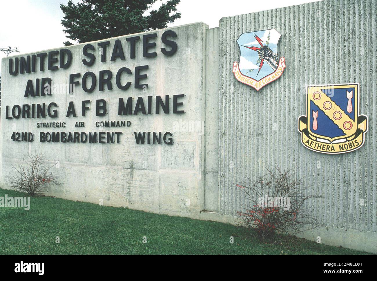 A view of the sign at the base's main gate. Base: Loring Air Force Base ...