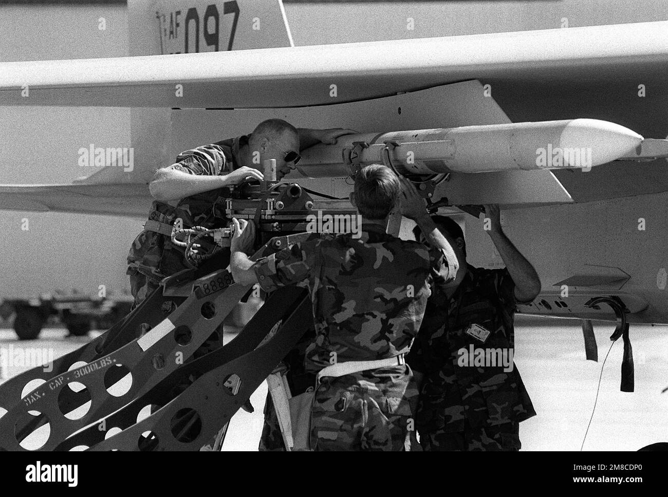 TECH. SGT. Ron Riddell, weapons specialist, aids 355th Aircraft ...