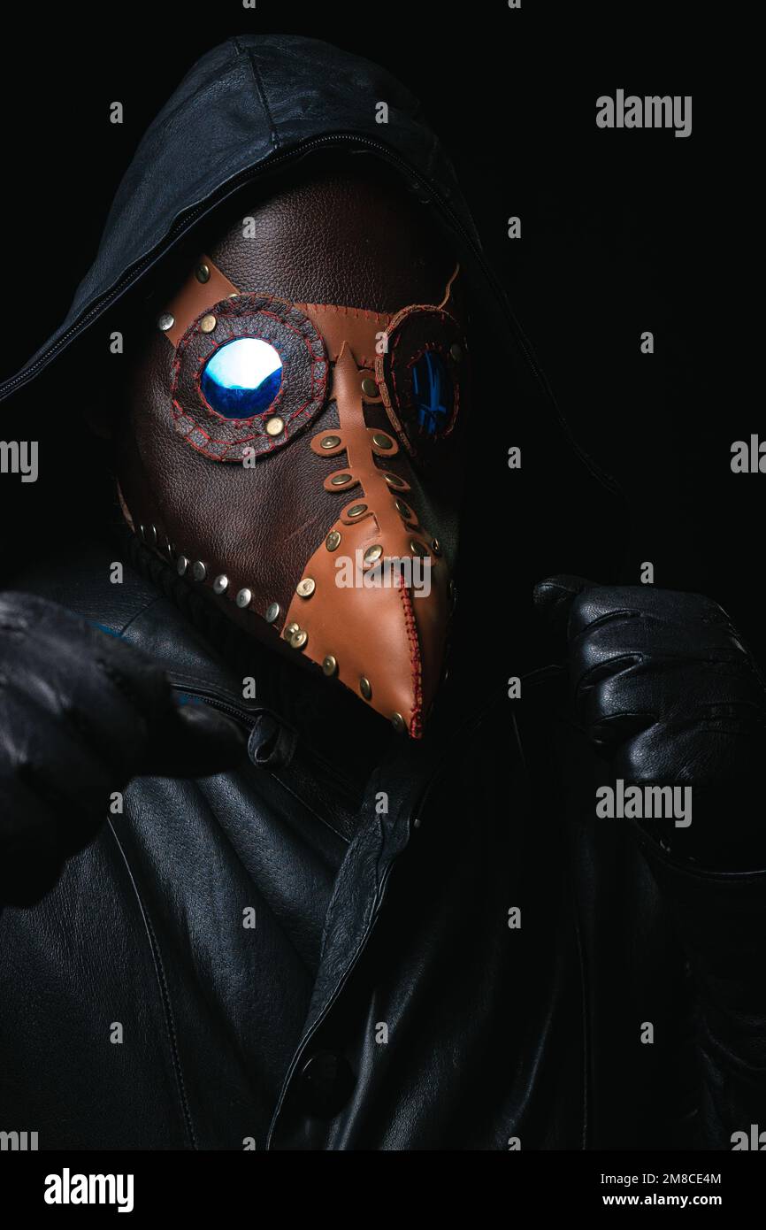Plague doctor with crow-like mask isolated on black background Creepy ...