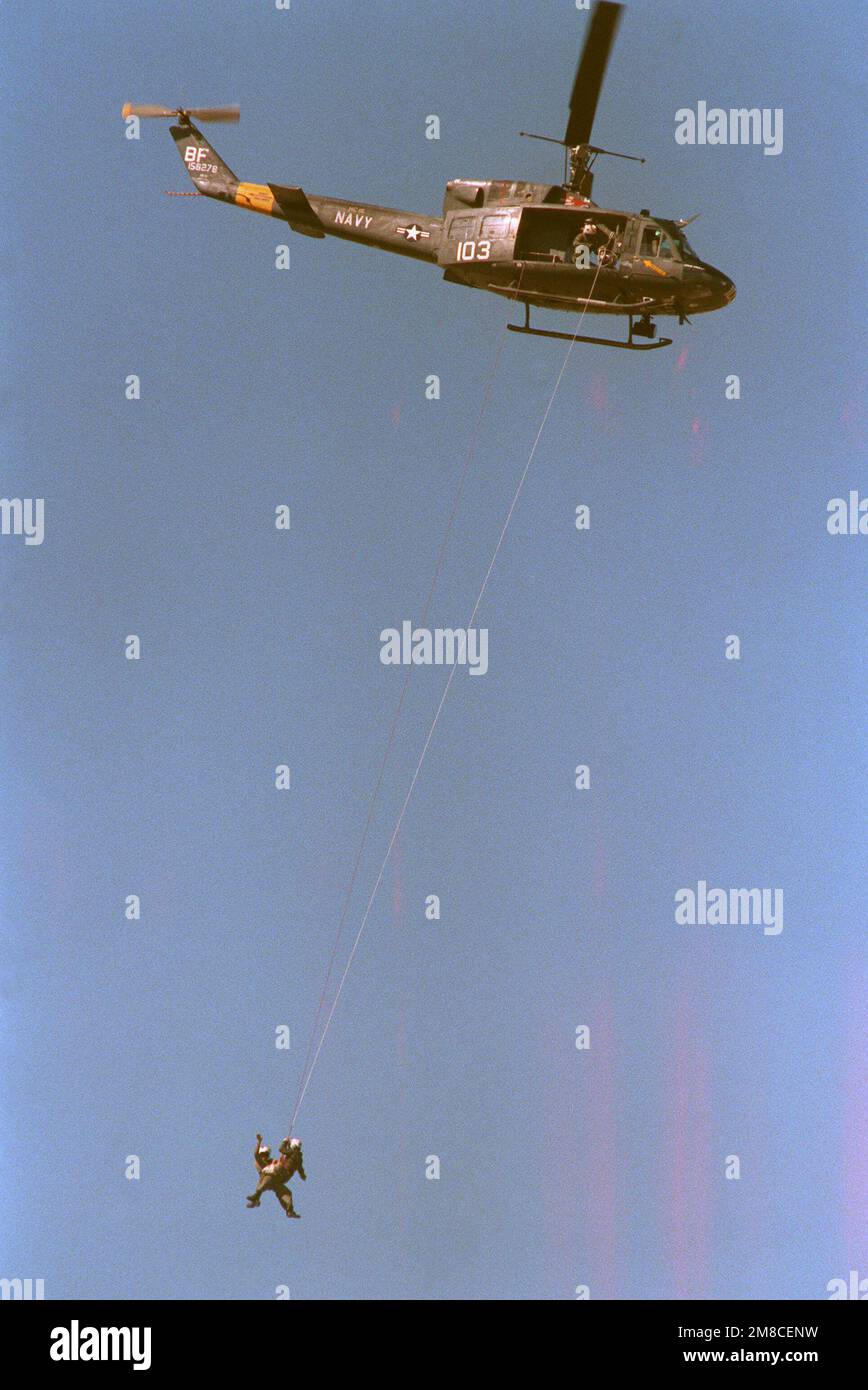 Airmen rappel from a Helicopter Combat Support Squadron 16 (HC-16) UH ...