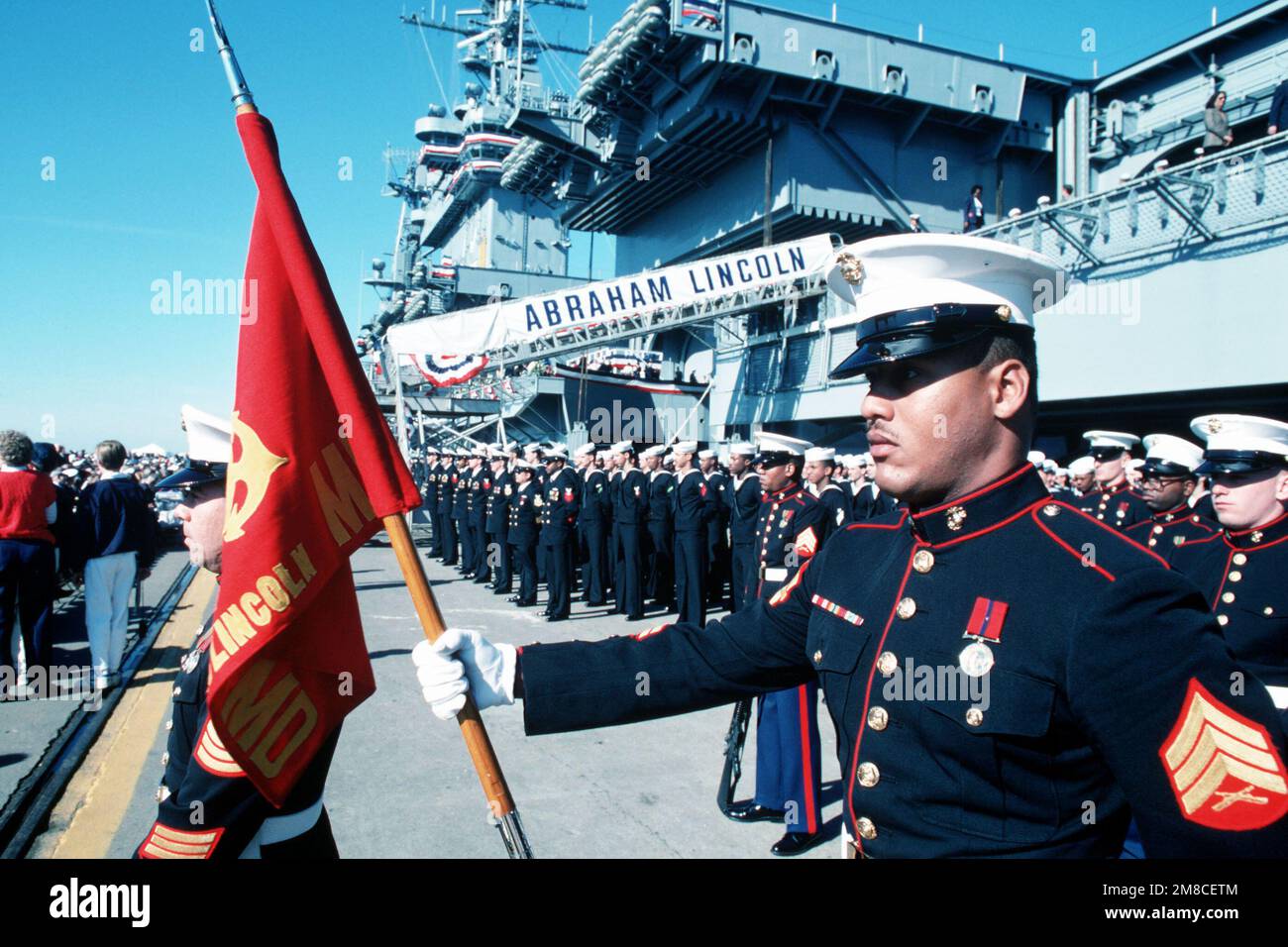 Crew members and members of the Marine detachment aboard the nuclear ...