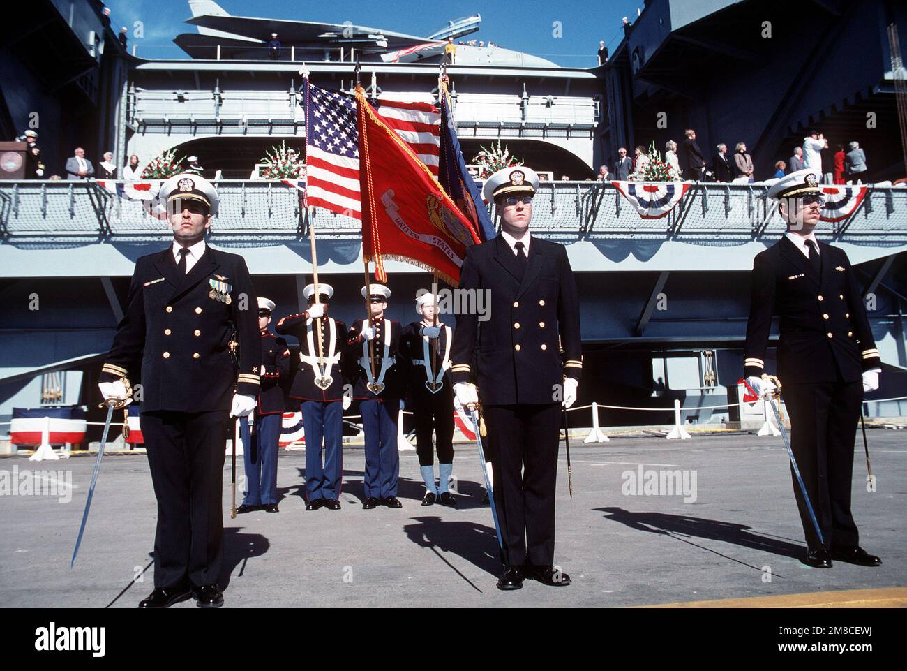 A joint Marine-U.S. Navy color guard presents the colors during the ...