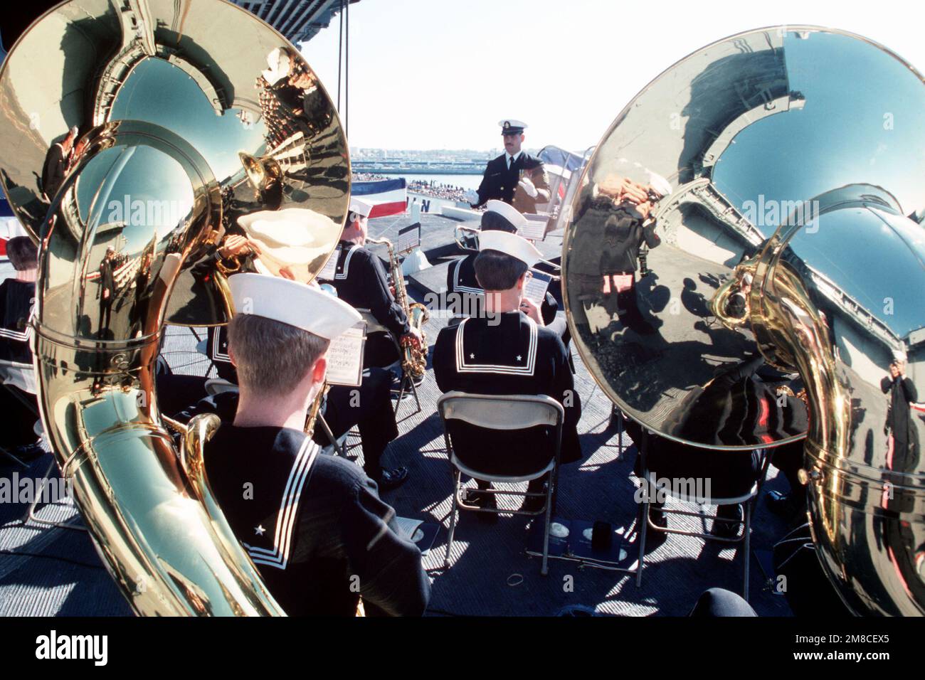 A United States Navy band plays a selection during the ship's ...