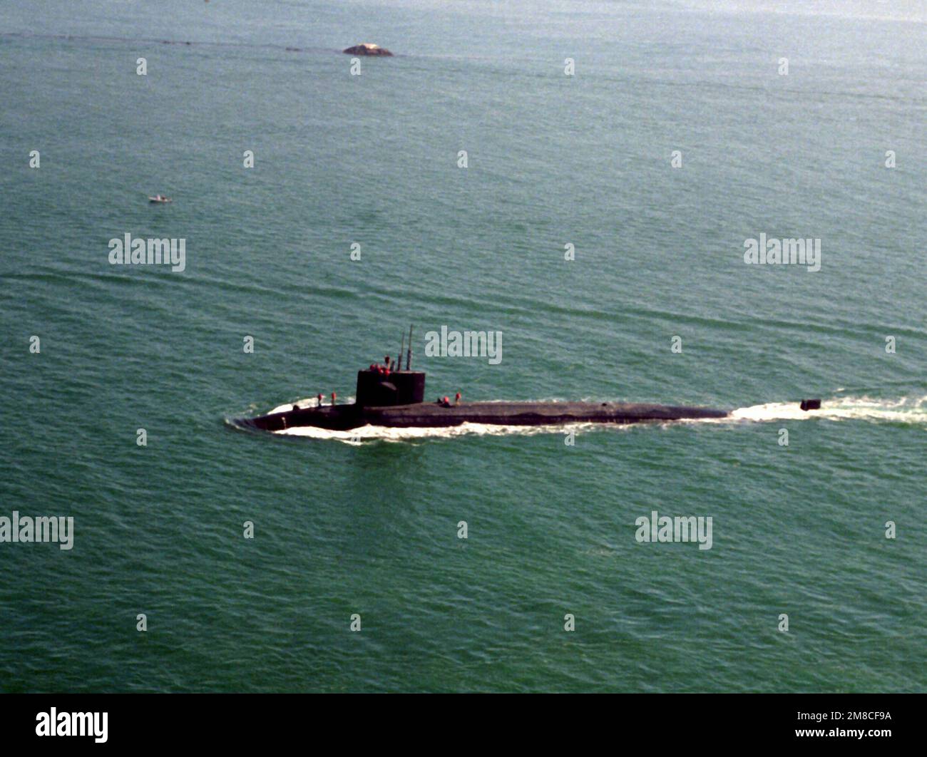 A port view of the nuclear-powered attack submarine USS PUFFER (SSN-652 ...