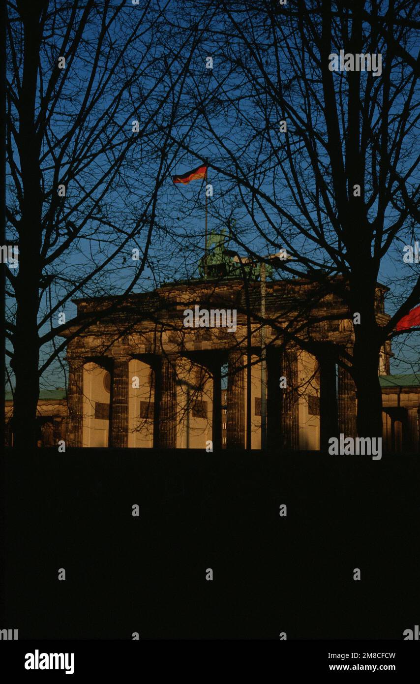 The East German flag flies atop the Brandenburg Gate. Base: Berlin ...