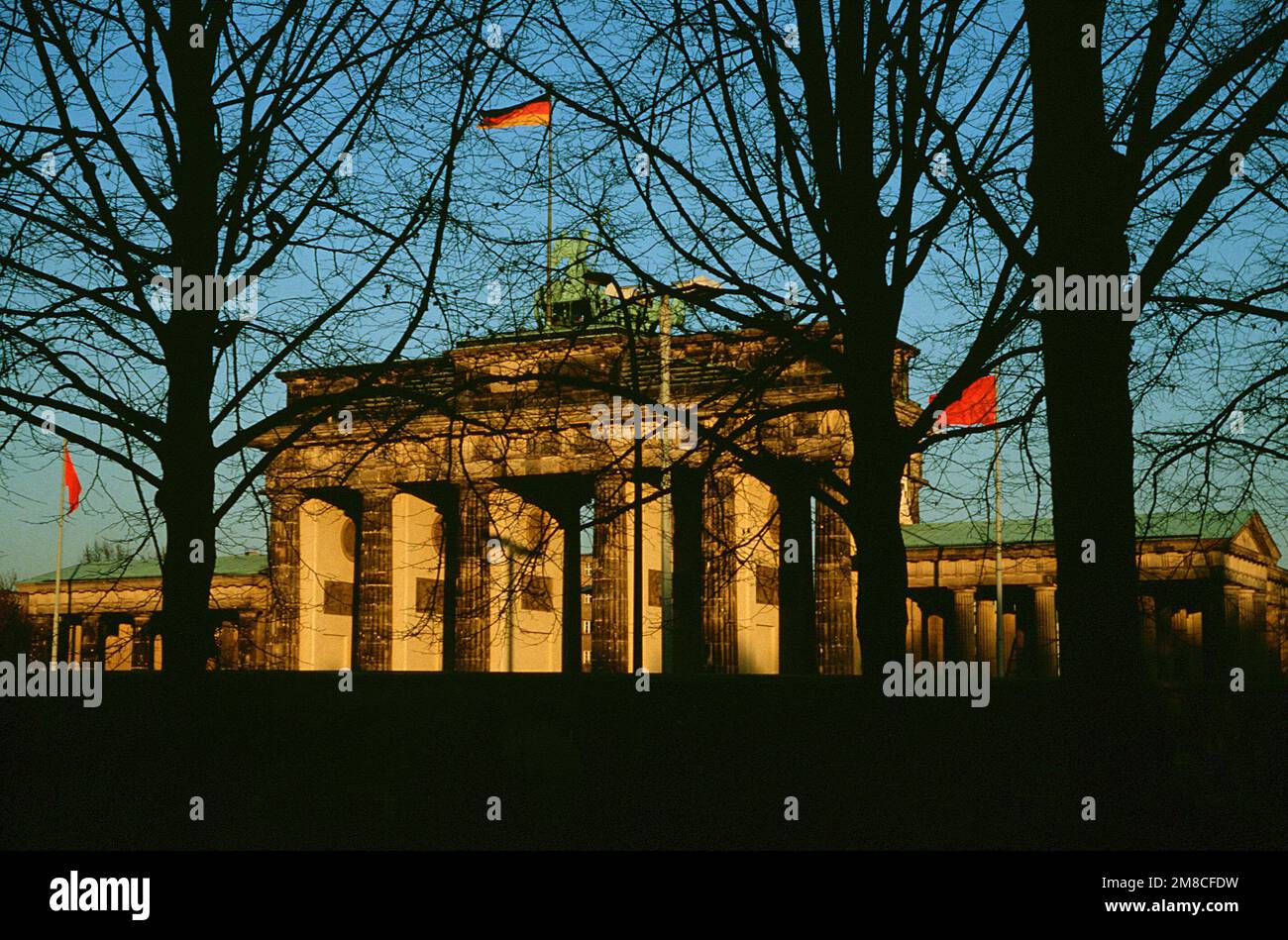 The East German flag flies atop the Brandenburg Gate. Base: Berlin ...