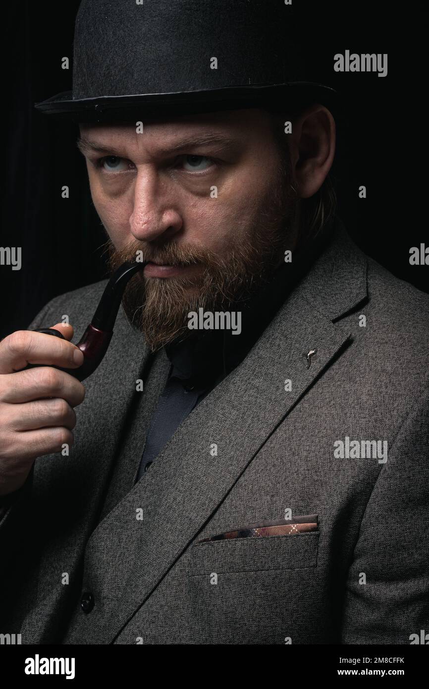 stylish man in retro outfit suit hat smoking wooden pipe sherlock ...