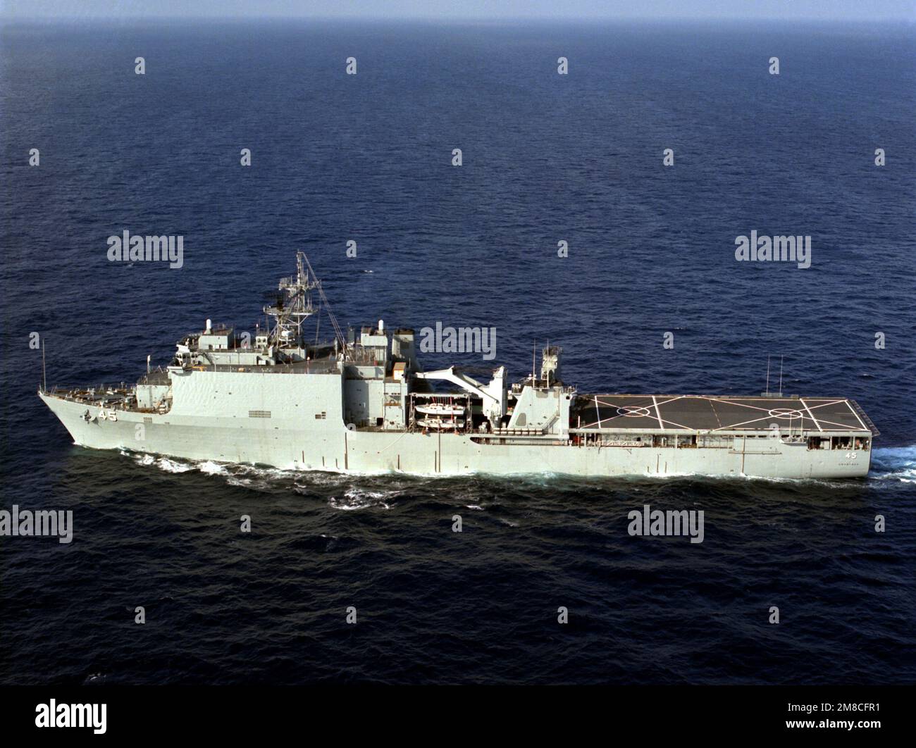 An elevated port beam view of the dock landing ship COMSTOCK (LSD-45 ...