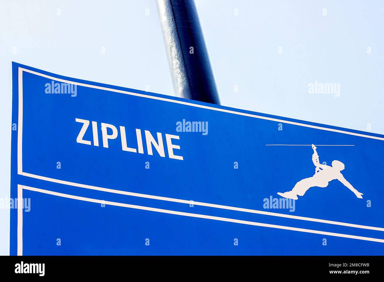 Blue and white extreme Zipline active sport sign on the board against ...