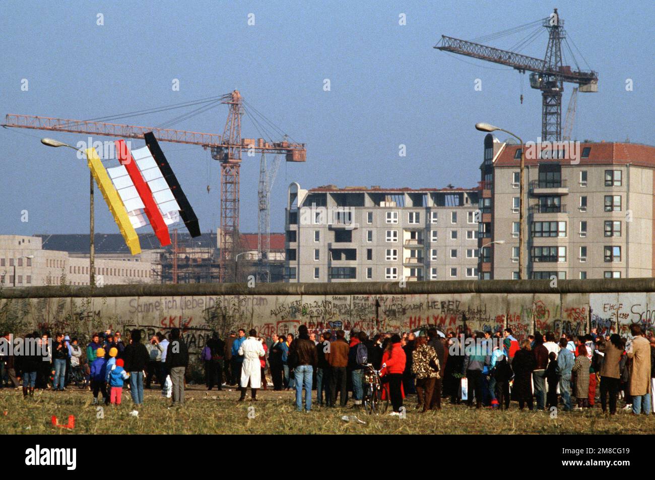 A large kite bearing the shared colors of the East and West German ...