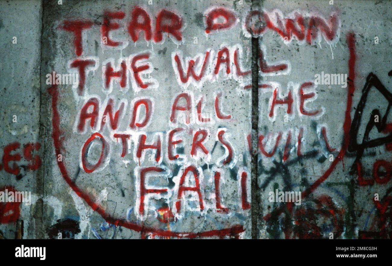 Graffiti on the west side of the Berlin Wall expresses the desire for a ...