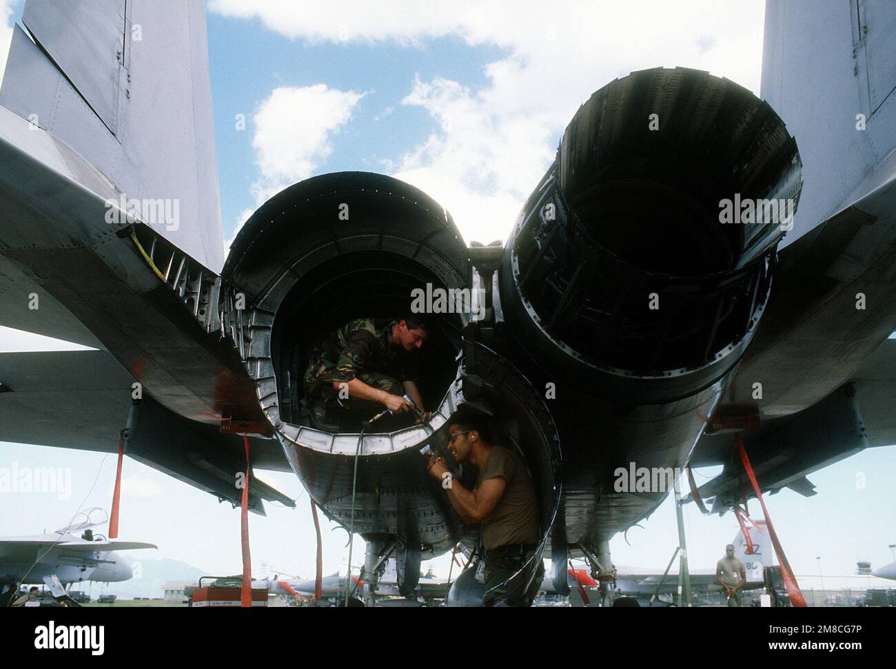 SGT. Mark A. Jones, standing, and SGT. Lucien G. Castowguay rivet a ...
